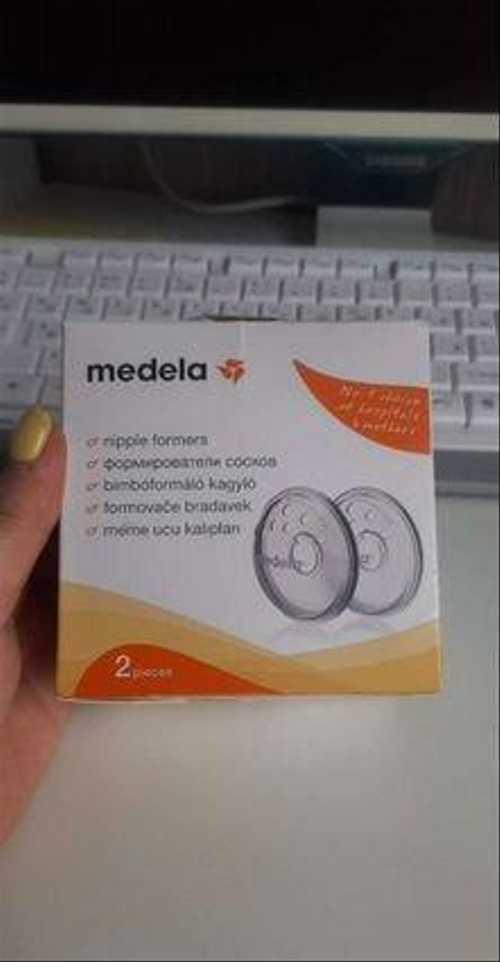 Накладки на грудь medela. Формирователи сосков