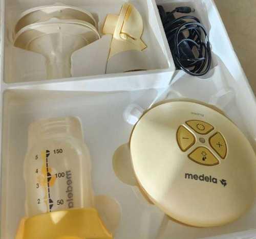 Молокоотсос medela swing flex