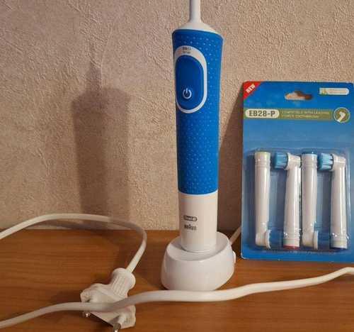 Электрическая зубная щетка oral b