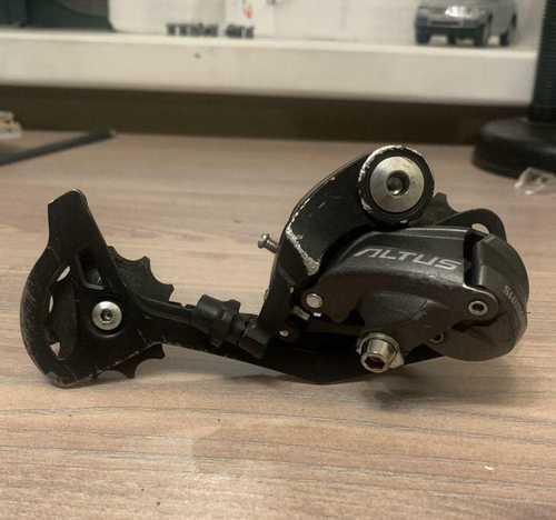 Задний переключатель shimano altus 9sp