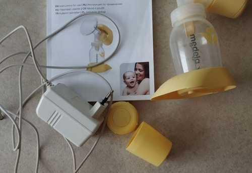 Молокоотсос электрический Medela mini electric