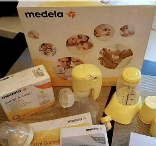 Молокоотсос medela электрический