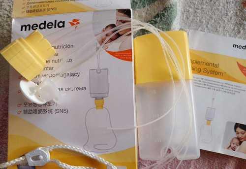 Дополнительная система для кормления medela