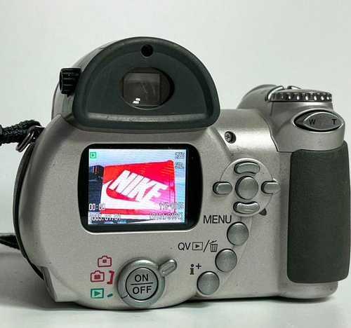 Винтажный фотоаппарат minolta