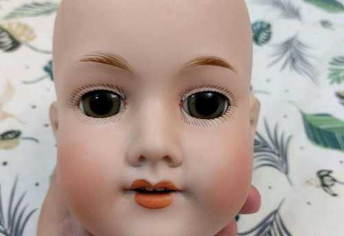 Голова антикварной куклы