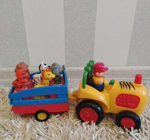Игрушка музыкальный трактор