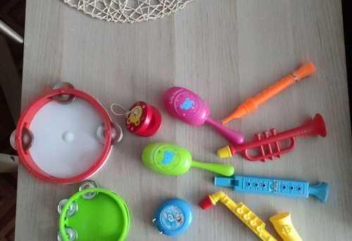 Детские игрушечные музыкальные инструменты