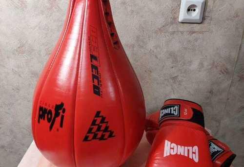 Боксерская груша и боксёрские перчатки