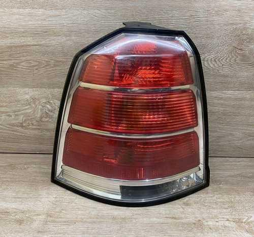 Фонарь левый Opel Zafira B дорестайлинг 112126