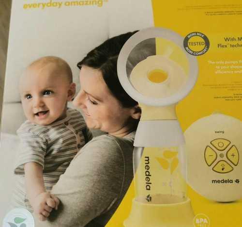 Молокоотсос medela электрический