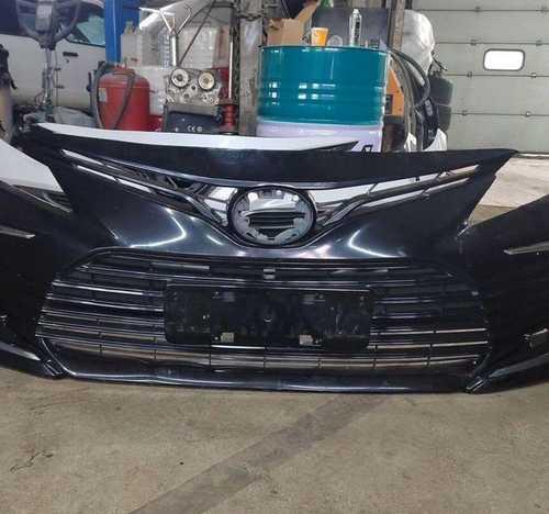 Бампер с решётками Toyota Camry 75