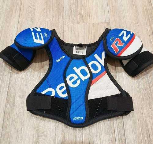 Нагрудник хоккейный Reebok YT