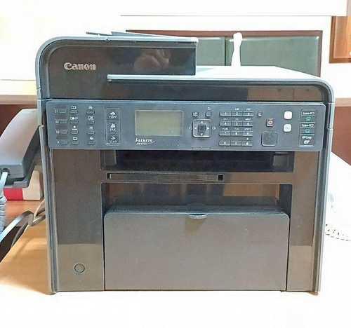 Принтер лазерный мфу Canon i-sensys mf4750