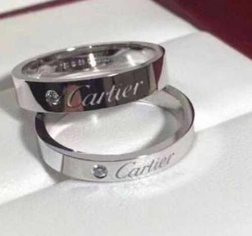 Обручальные кольца Cartier 14гр 0.06ct