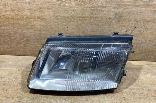 Фара передняя левая VW Passat B5 141658