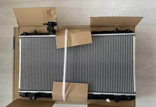 Радиатор охлаждения Suzuki Liana Luzar LRc2454