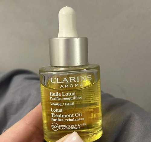Масло для лица clarins lotus