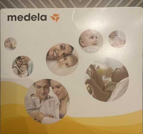 Молокоотсос medela электрический