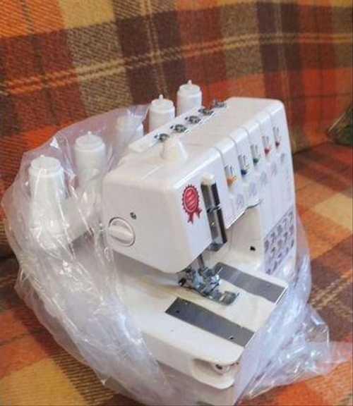 Новая швейная машинка,оверлок Merrylock 5550A