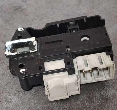 Блокировка люка сма Indesit Ariston C00307442