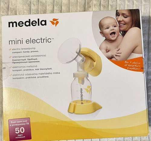 Молокоотсос medela электрический