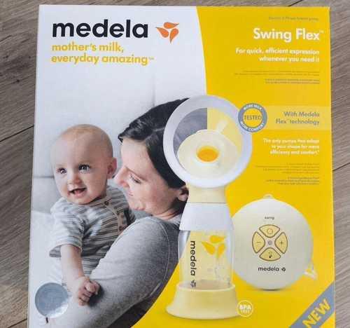 Молокоотсос medela электрический