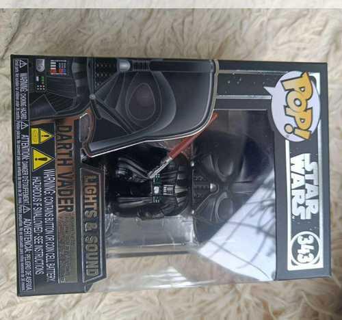 Funko pop darth vader (light and sound)