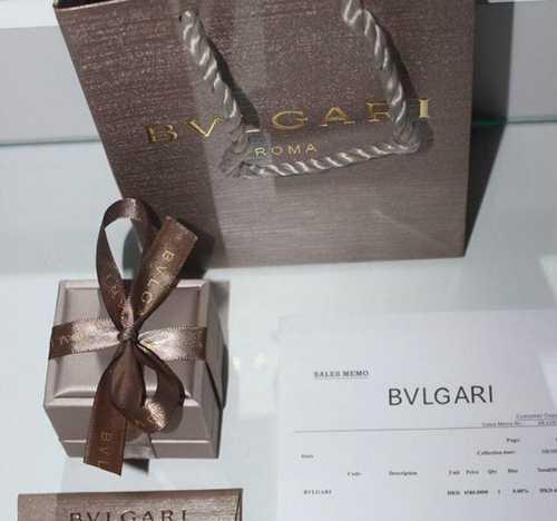 Золоте кольцо Bvlgari с камнями