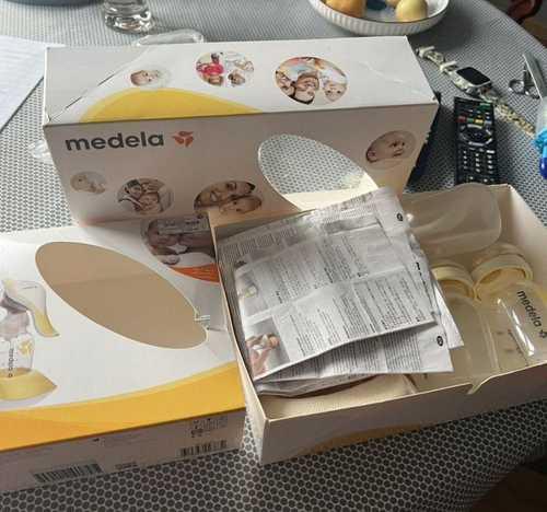 Молокоотсос medela ручной