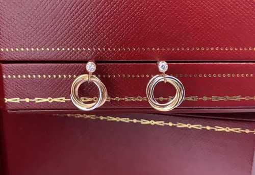 Cartier золотые серьги Тринити