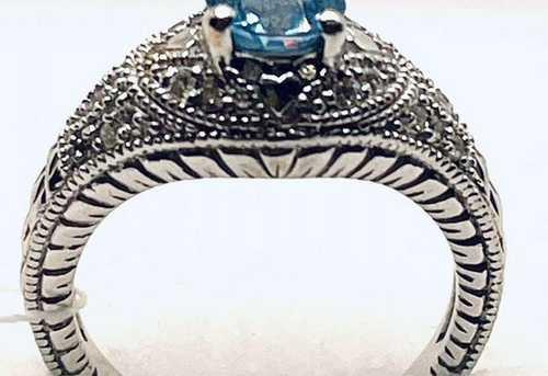 Золотое кольцо с бриллиантами и топазом 750