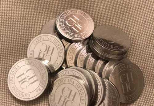 Монеты жетоны Carolina Herrera