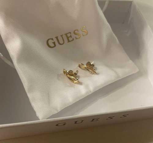 Серьги гвоздики золотые guess