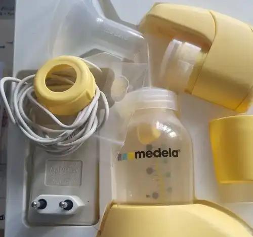 Молокоотсос medela электрический