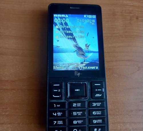 3 симки Сотовый телефон Fly TS114 черный