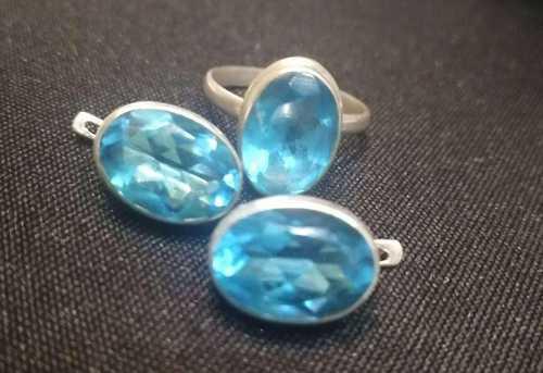 Серебряные серьги и кольцо с голубыми камнями