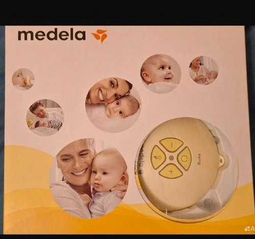 Молокоотсос medela электрический