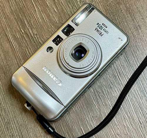 Плёночный фотоаппарат canon prima 105 u date