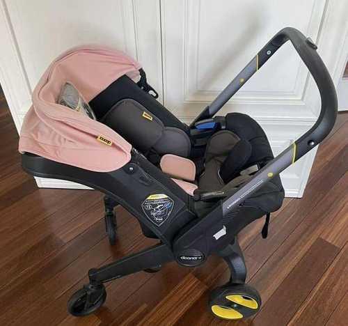 Коляска автокресло doona с базой isofix