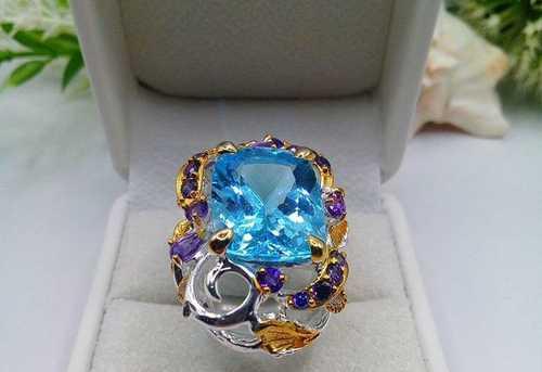 Авторское кольцо с голубым топазом и аметистами