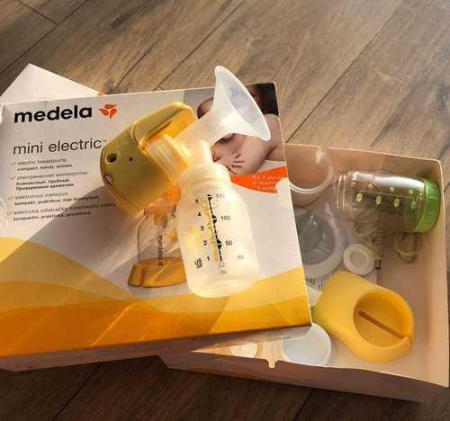 Молокоотсос medela электрический