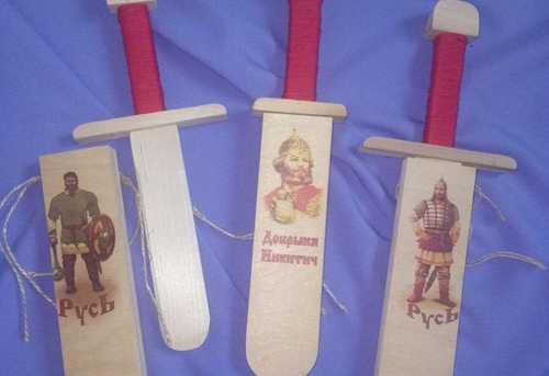 Мечи деревянные с рисунками богатырей на ножнах