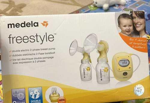 Молокоотсос электрический двойной medela