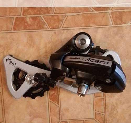 Задний переключатель shimano acera