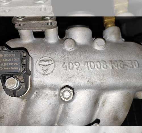 Продам впускной коллектор в сборе змз-409