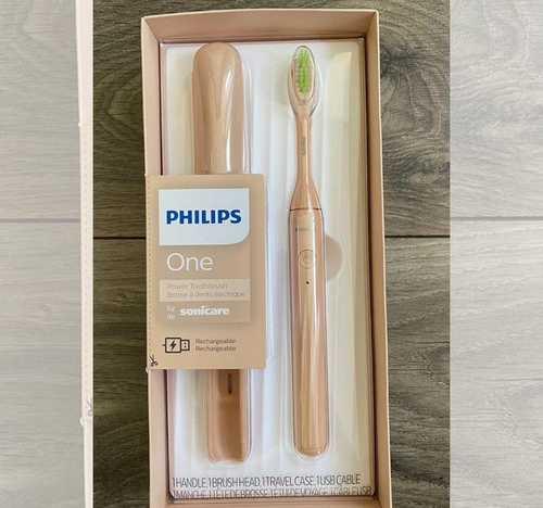 Электрическая зубная щетка Philips