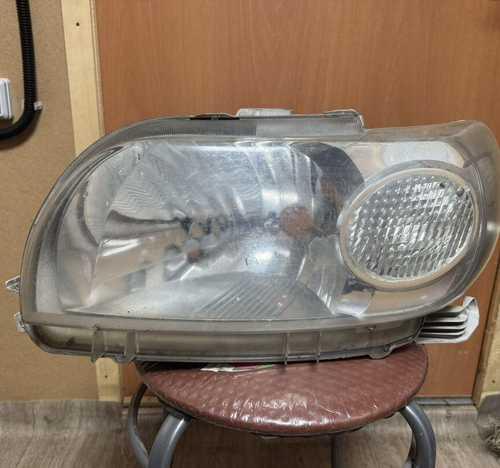 Фара Левое Toyota Porte NNP10 2008г