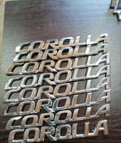 Эмблема задняя Toyota Corolla