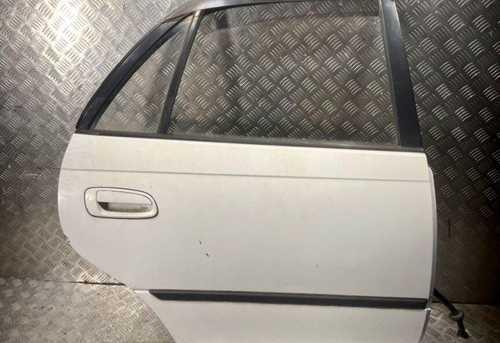 Дверь задняя правая Toyota Carina 1995
