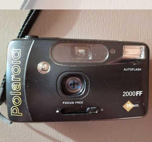 Пленочный фотоаппарат polaroid и Canon